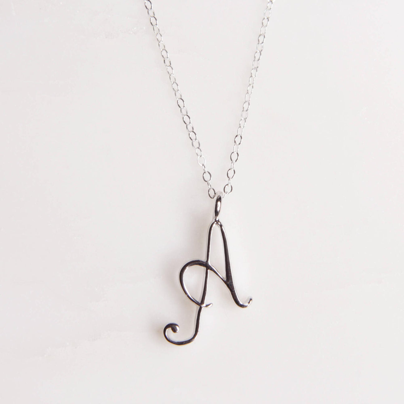 A Cursive Silver Initial Pendant – Soul & Little Rose